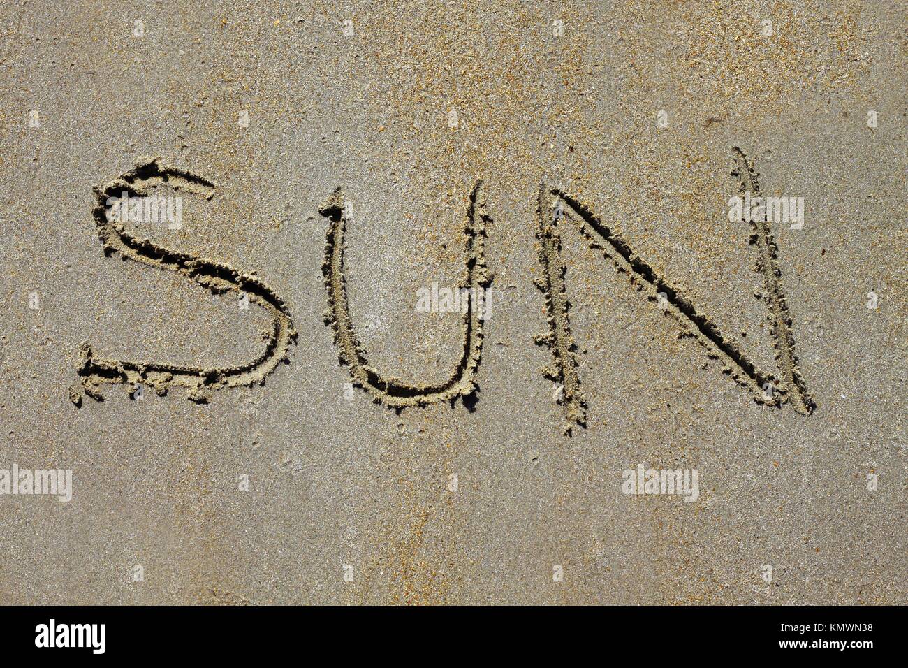 word sun spell on beach wet sand such a summer vacation metaphor Stock ...