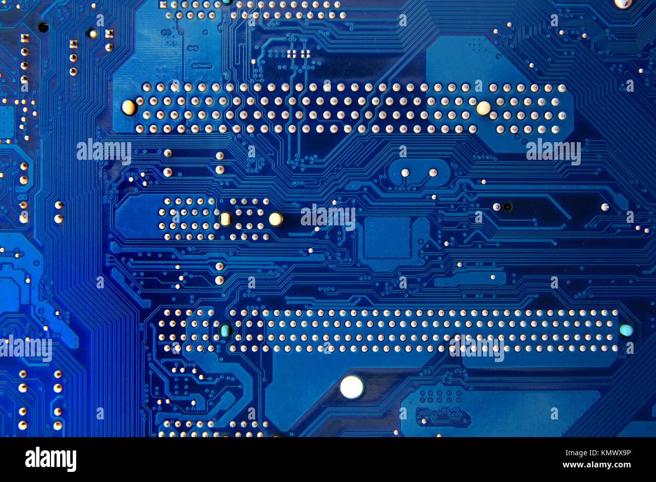 Blue electronics mainboad circuit technology background Stock Photo - Alamy