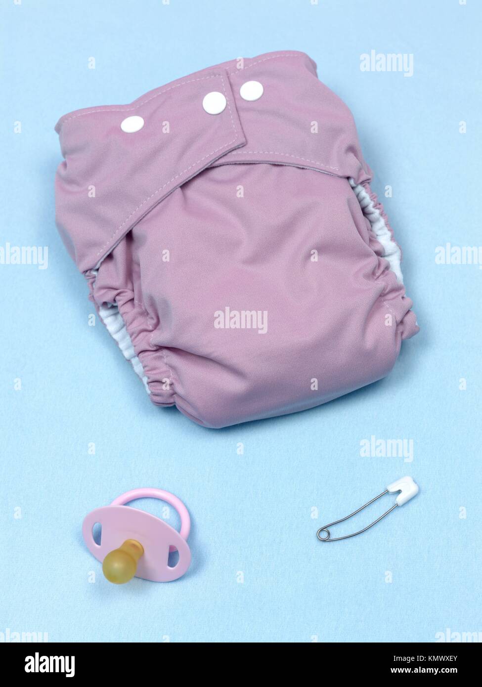 Blue nappy hi-res stock photography and images - Alamy