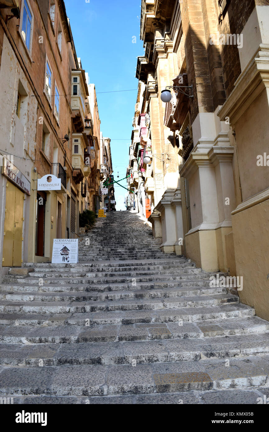 Steps in Valetta with shops and terrance houses Stock Photo - Alamy