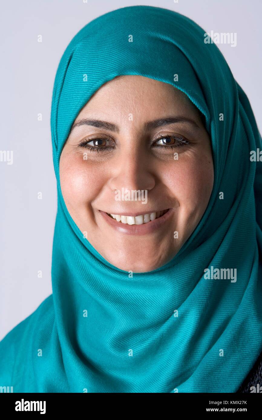 Portrait of a happy Arabic Muslim Woman Stock Photo - Alamy