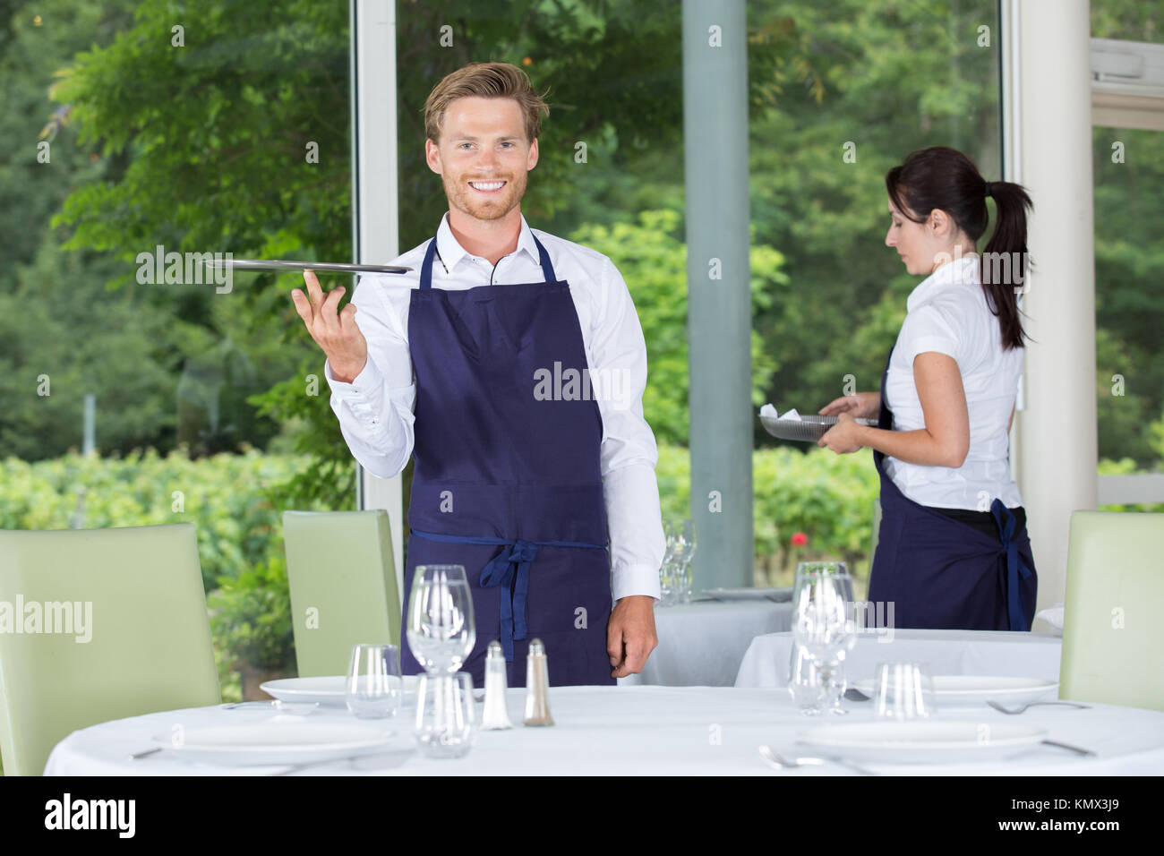 servers in the restaurant Stock Photo - Alamy