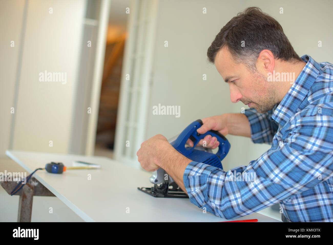 Hand band saw fabric hi-res stock photography and images - Alamy