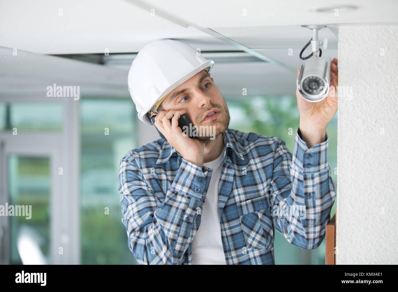 professional cctv technician working Stock Photo - Alamy