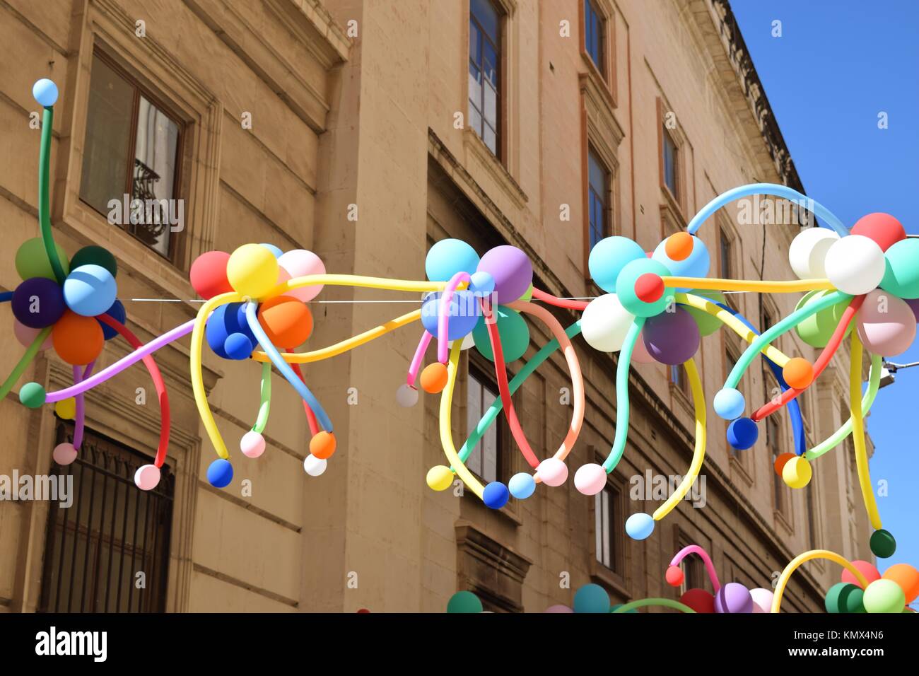 Long thin balloons hi-res stock photography and images - Alamy