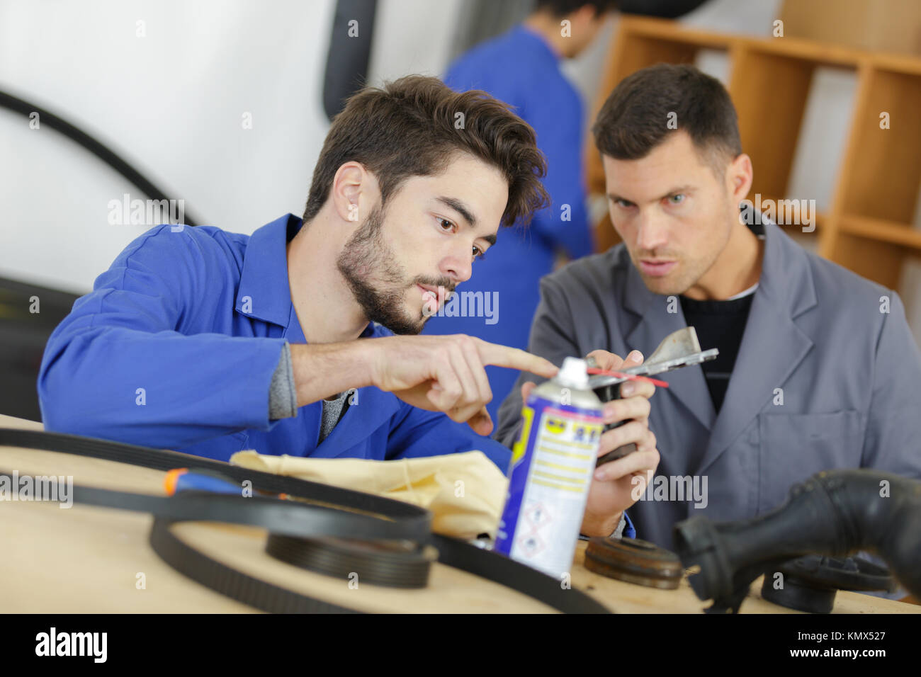 student with teacher studying automotive mechanic Stock Photo - Alamy
