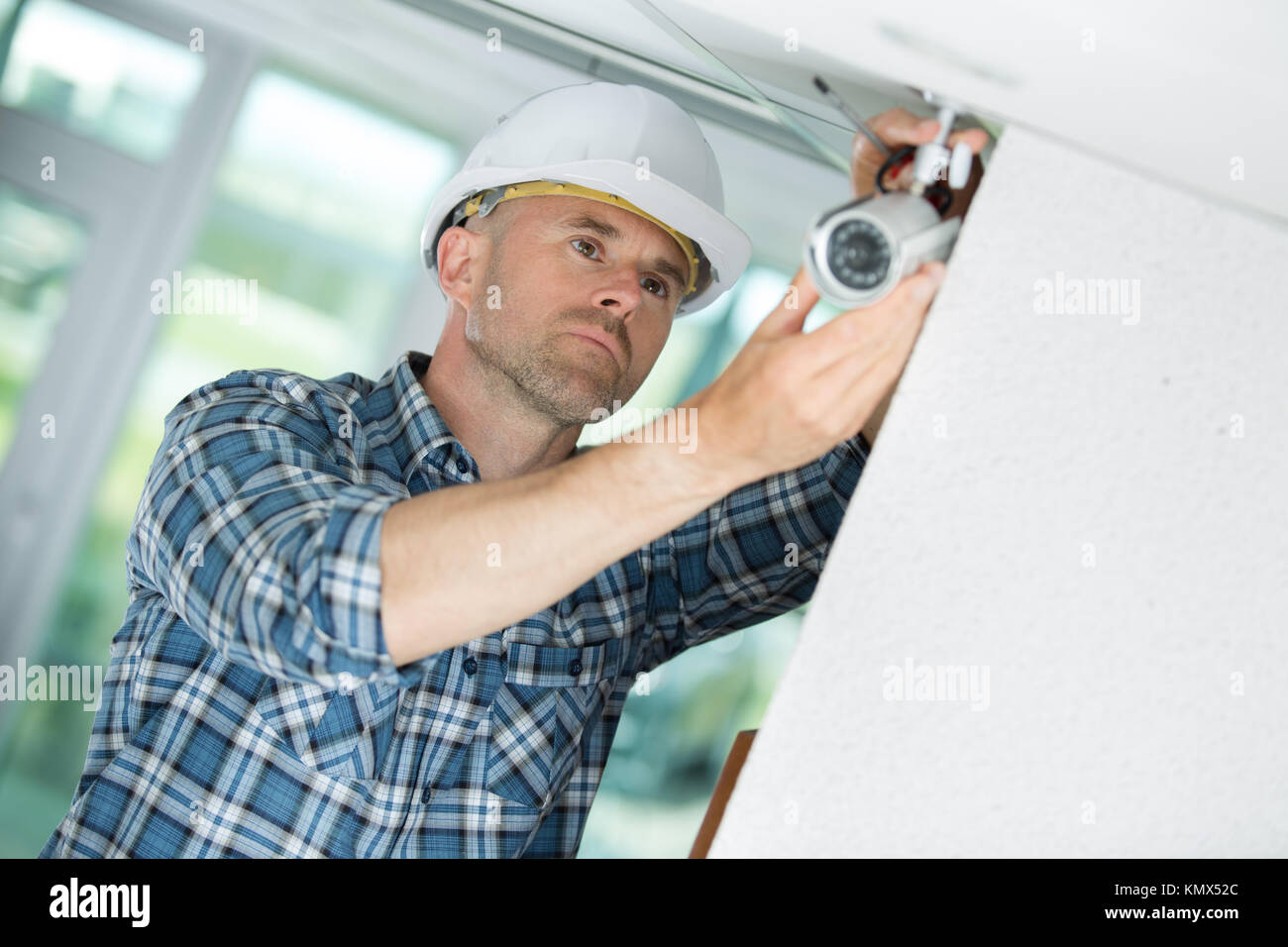 professional cctv technician working Stock Photo - Alamy