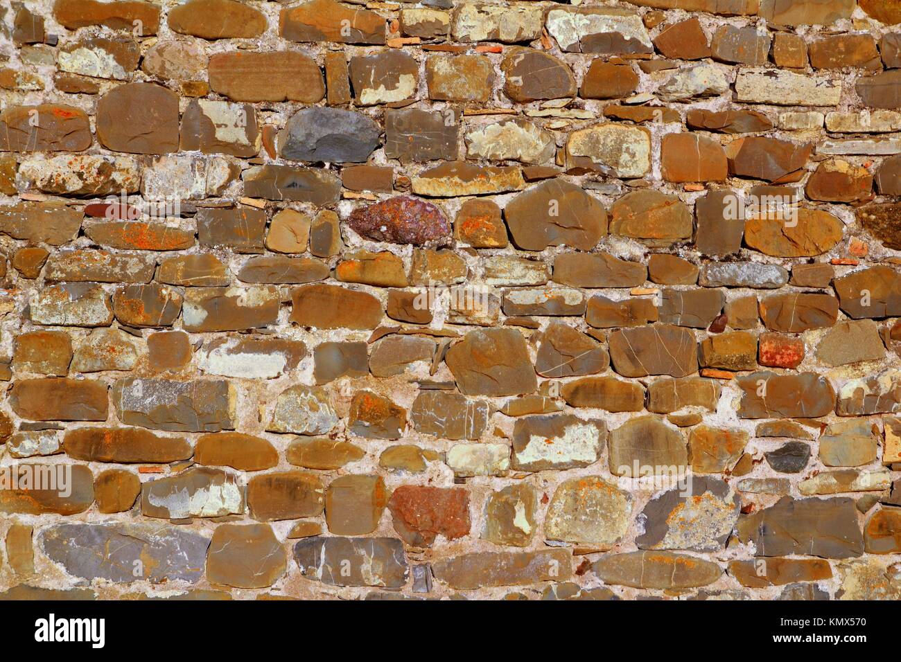colorful masonry wall stone construction house in Pyrenees Stock Photo ...