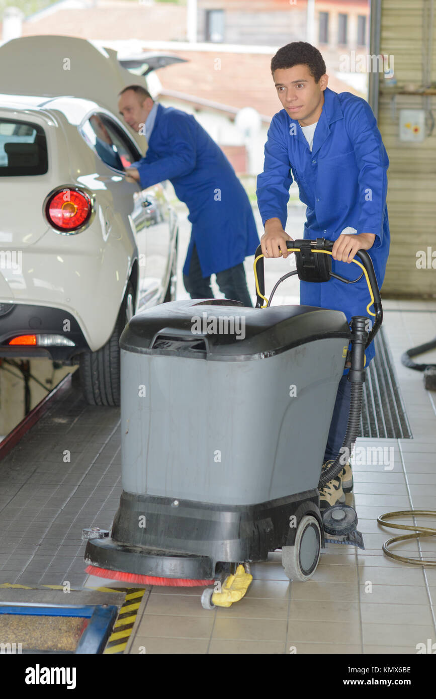 men in the garage Stock Photo - Alamy