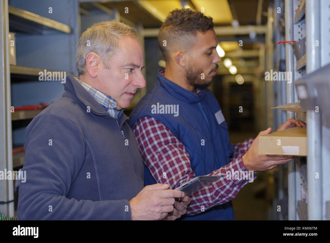 inspector inspecting the product sample Stock Photo - Alamy