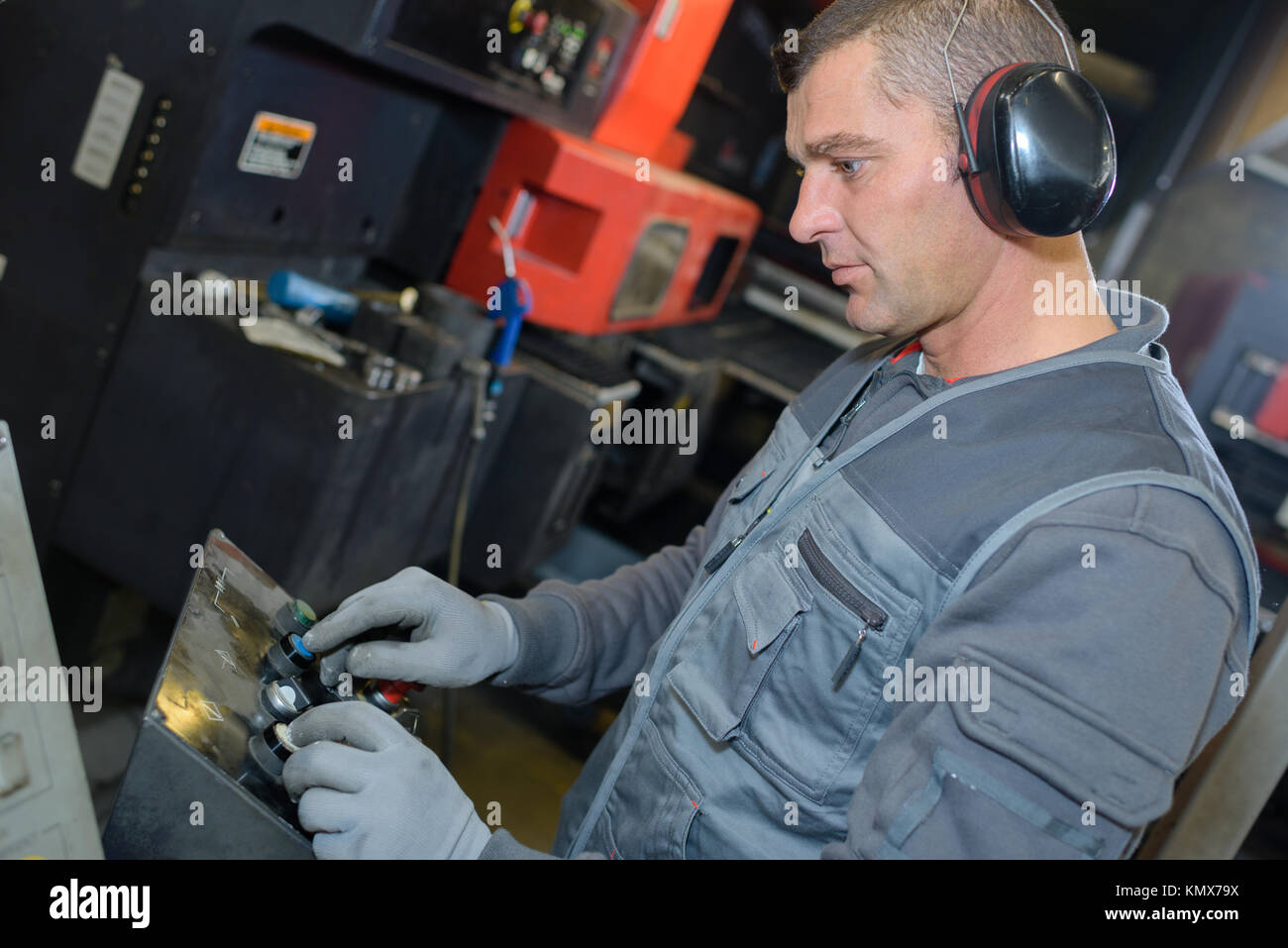 operating a machine Stock Photo - Alamy