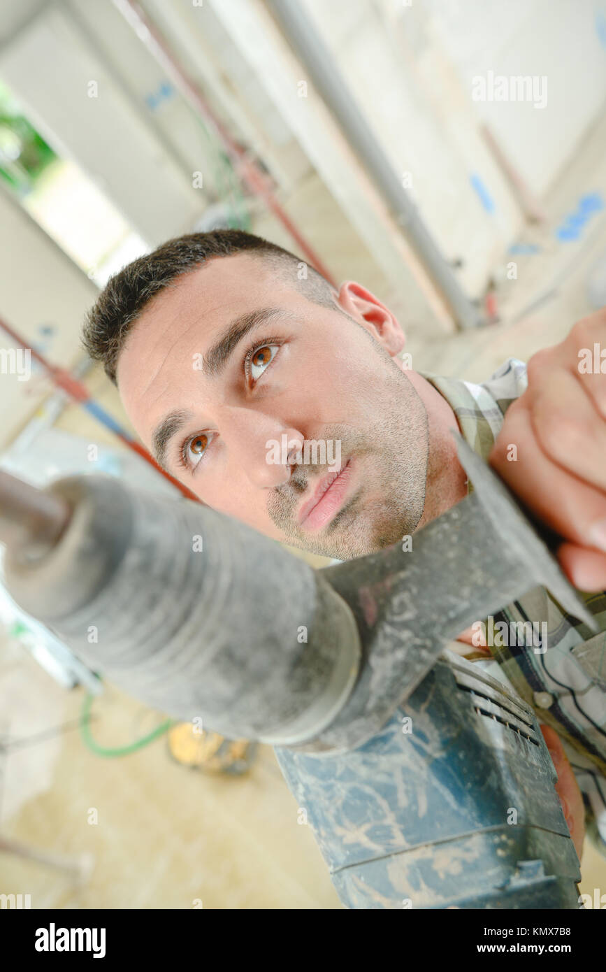 Construction worker carefully installing hi-res stock photography and images - Alamy