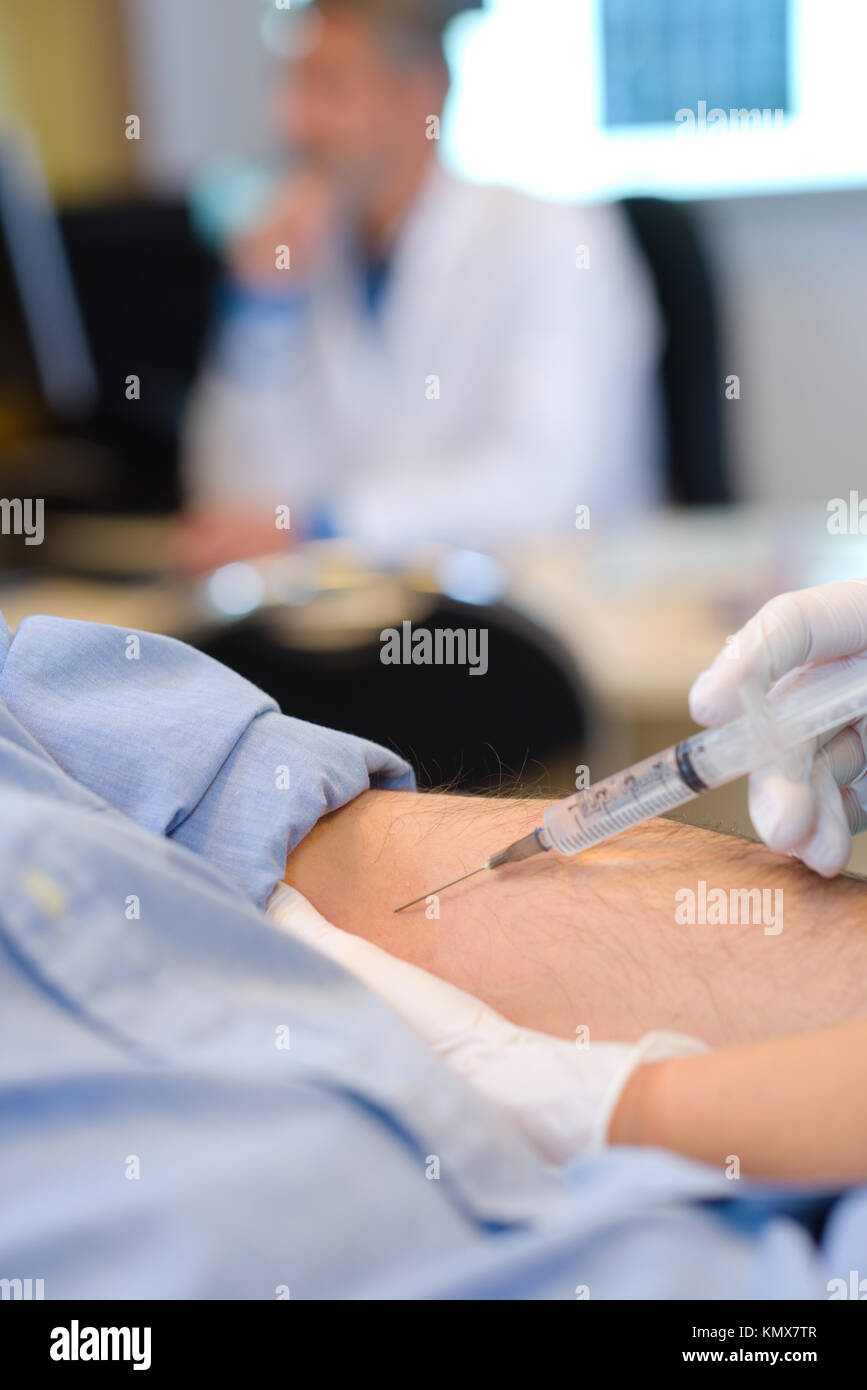 Hypodermic needle arm hi-res stock photography and images - Alamy