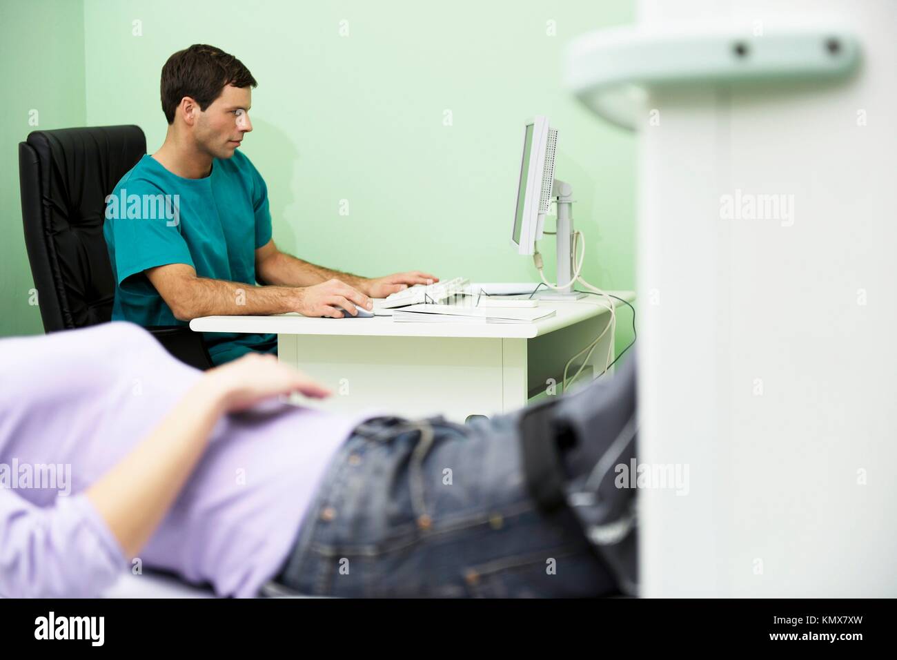 Doctor checking results hi-res stock photography and images - Alamy