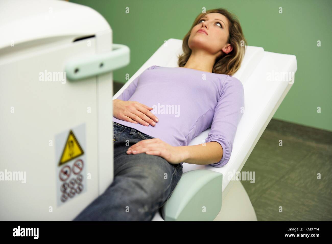 Young woman receiving MRI scan to her leg Stock Photo - Alamy