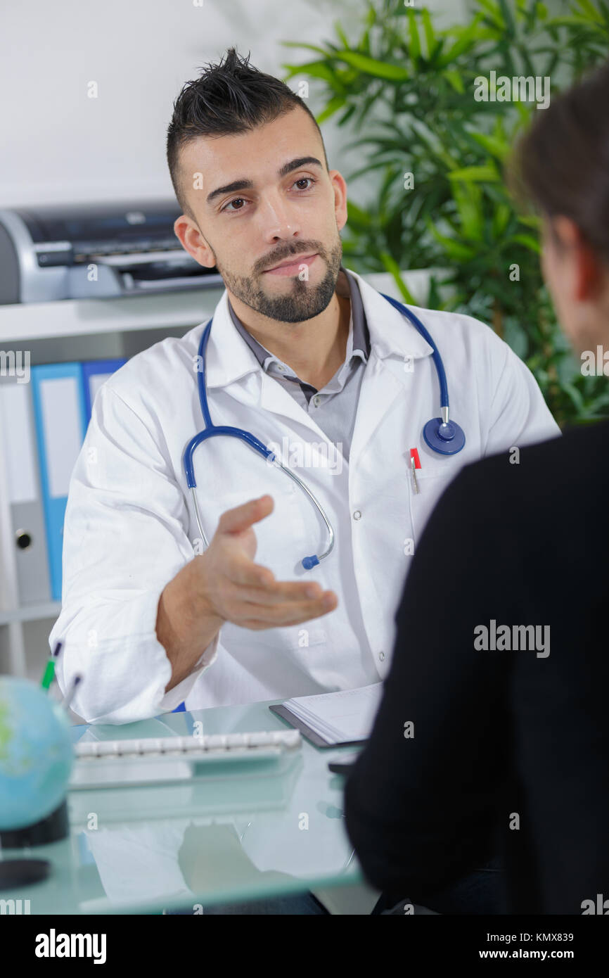 doctor ready to shake hands with a patient Stock Photo - Alamy