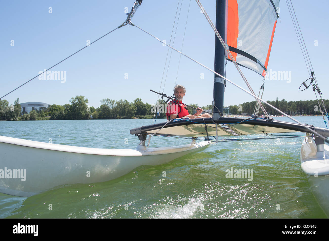 enjoying extreme sailing with racing sailboat Stock Photo - Alamy