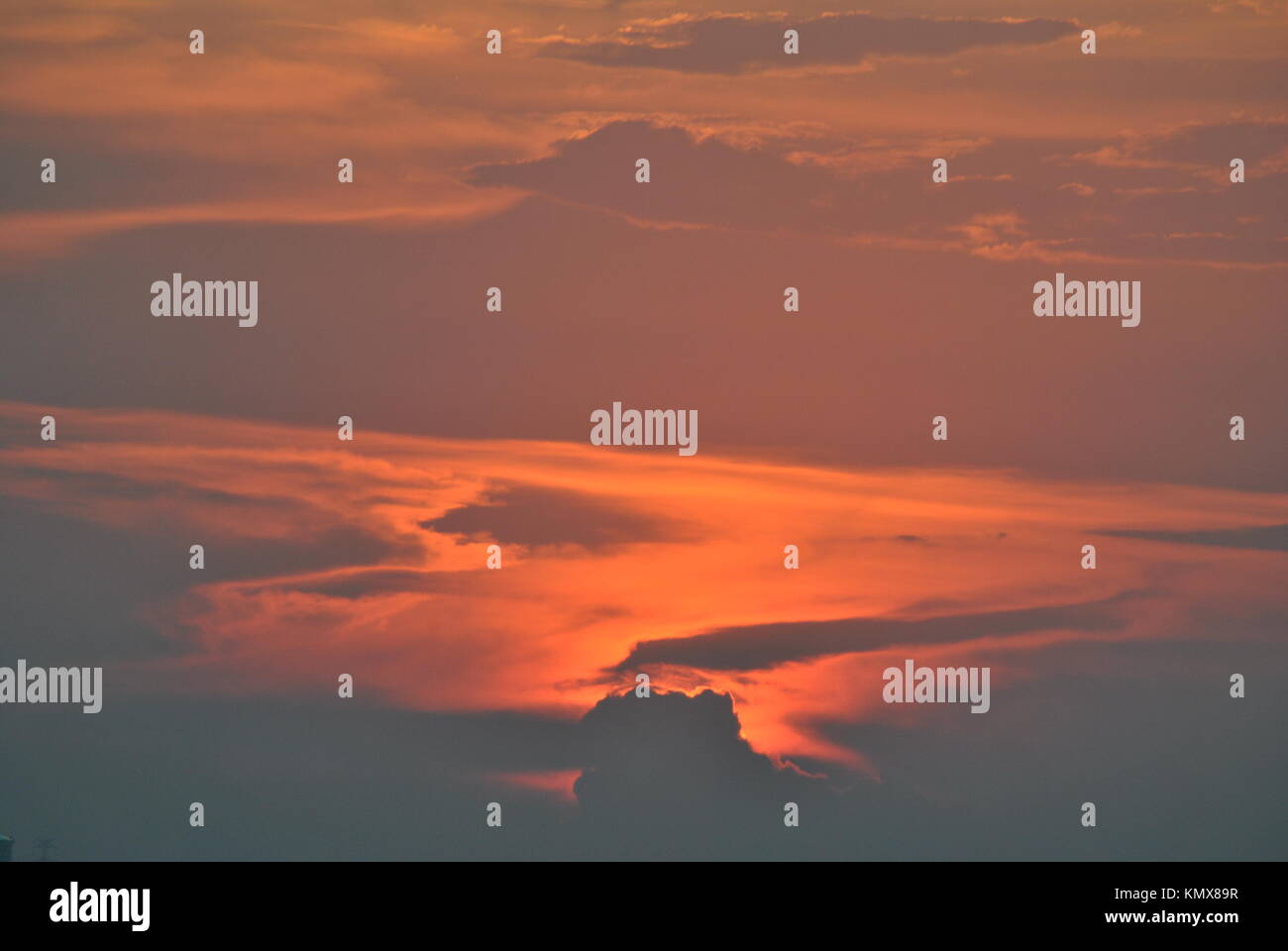 the clouds and the sky change color at sunset Stock Photo - Alamy