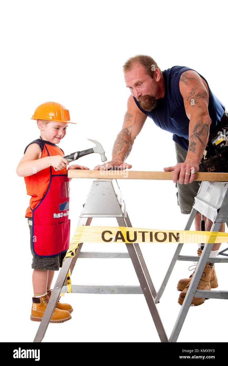 Boy hammering wood hi-res stock photography and images - Alamy