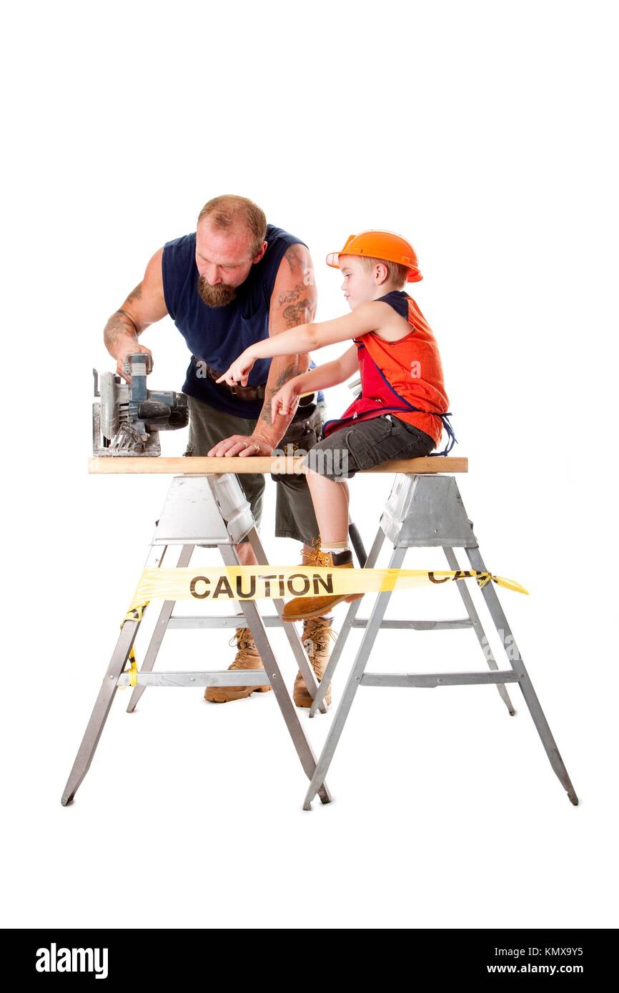 Boy sitting on see saw Cut Out Stock Images & Pictures - Alamy