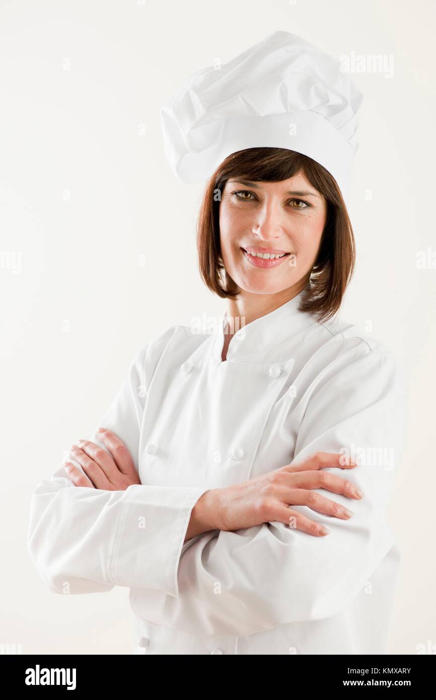 Confident Female Chef on White Background Stock Photo - Alamy