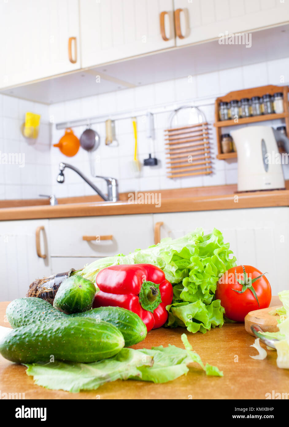 Fresh Vegetables lying on the kitchen table Stock Photo - Alamy