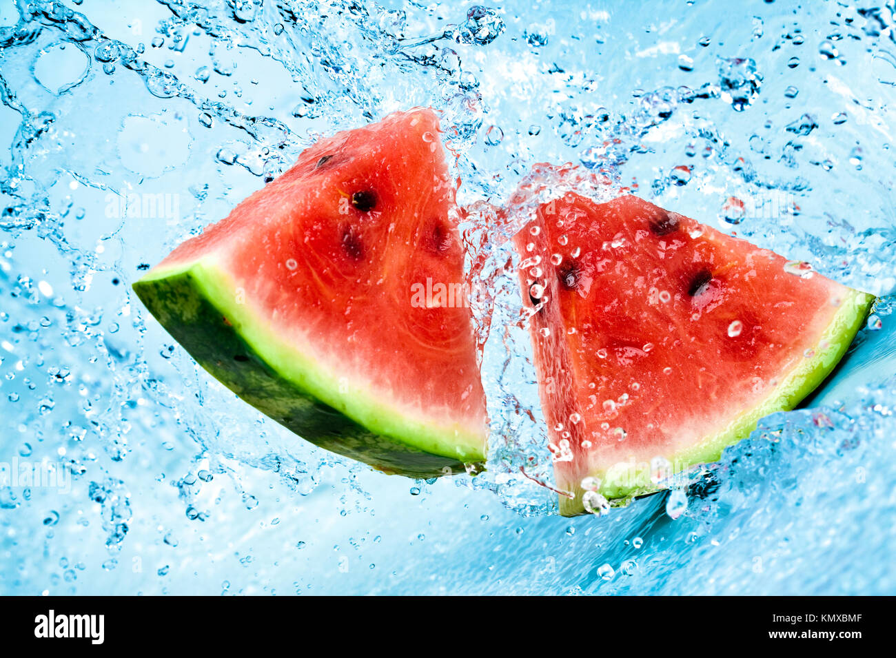fresh water splash on red watermelon Stock Photo - Alamy