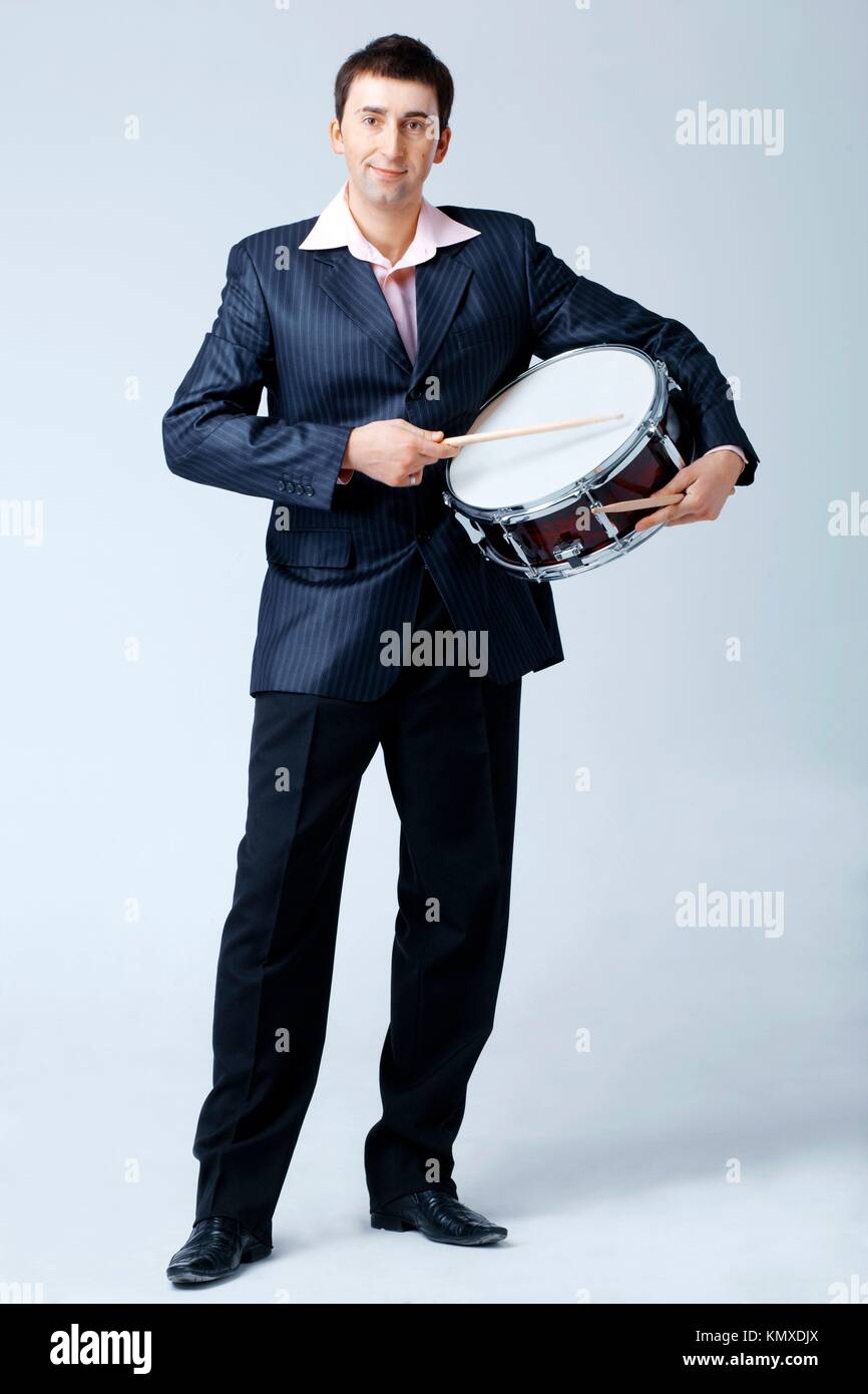 Man on drum hi-res stock photography and images - Alamy