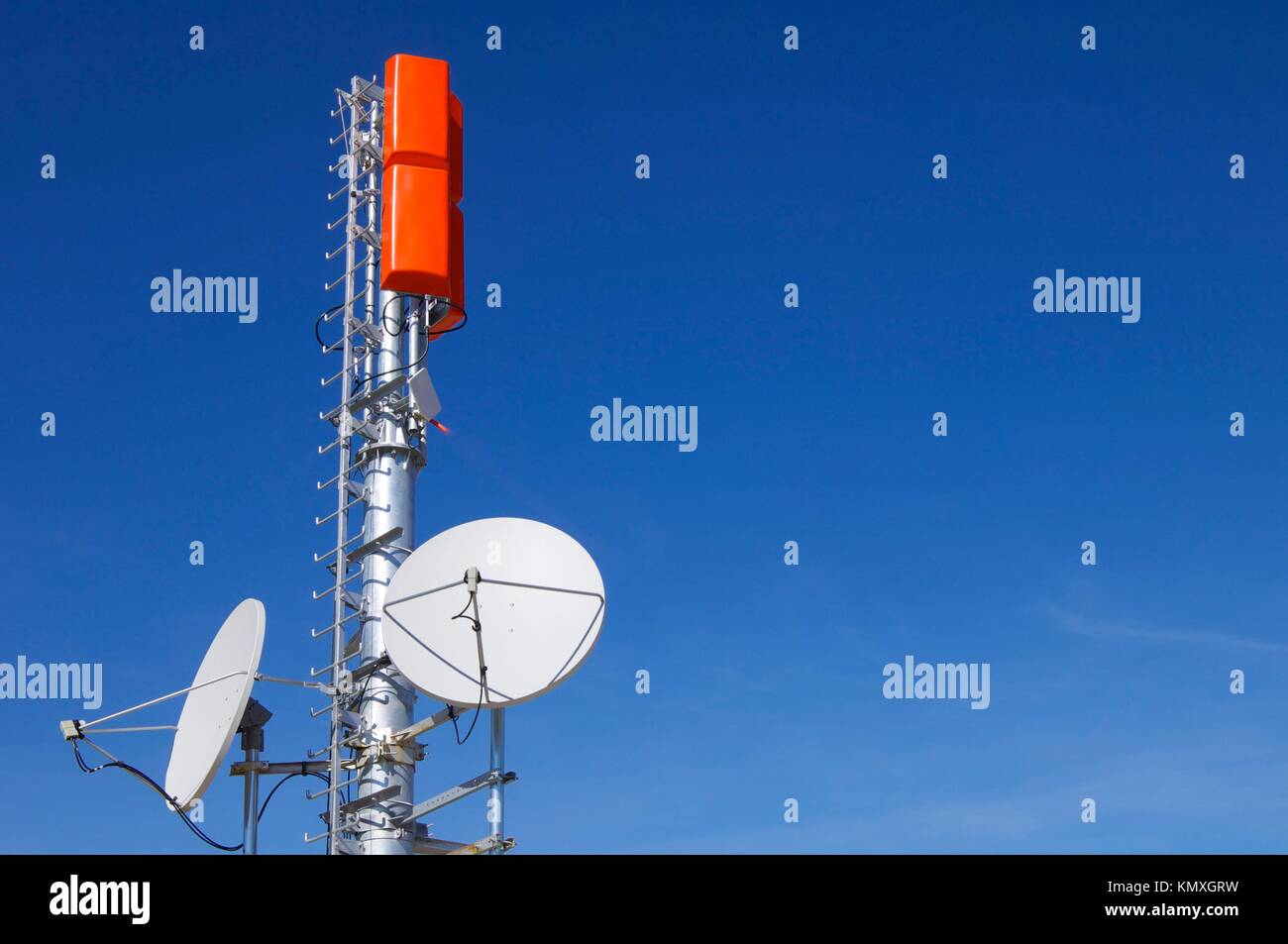 closeup of a television and radio repeater with a clear blue sky Stock ...