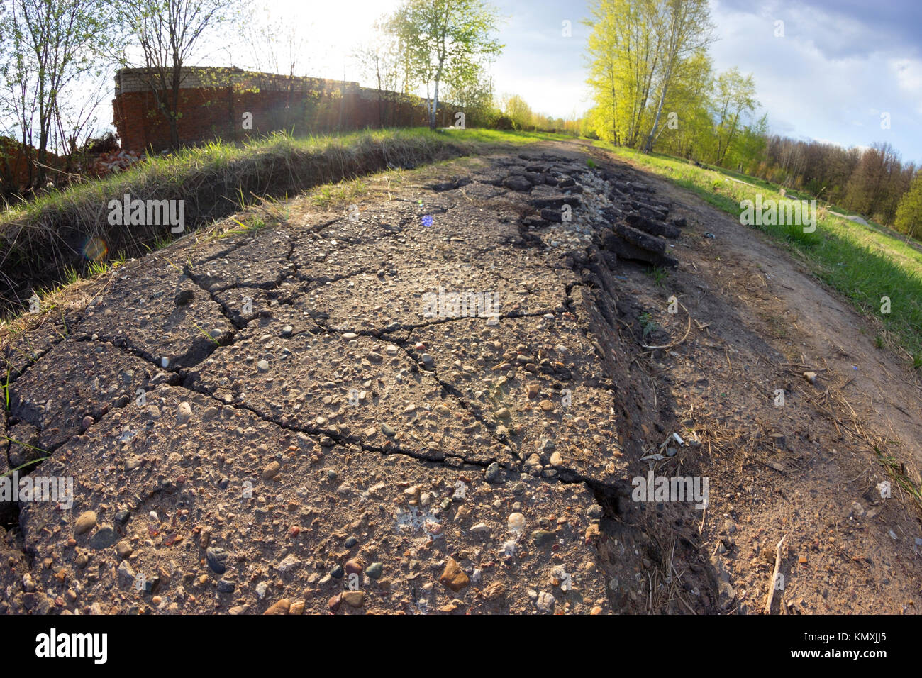grey damaged asphalt road. after war concept Stock Photo - Alamy