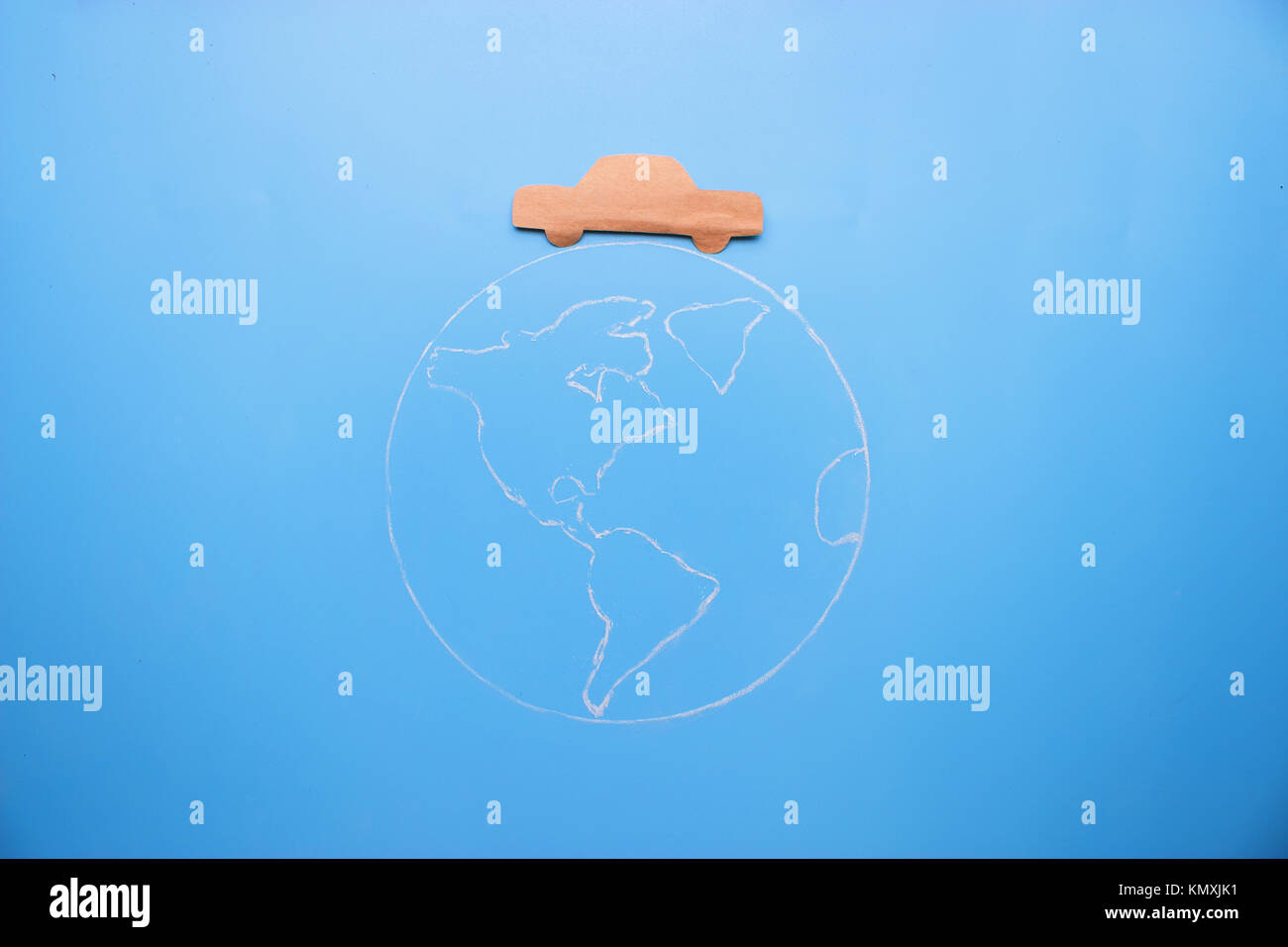 paper car on the earth. travel concept Stock Photo - Alamy
