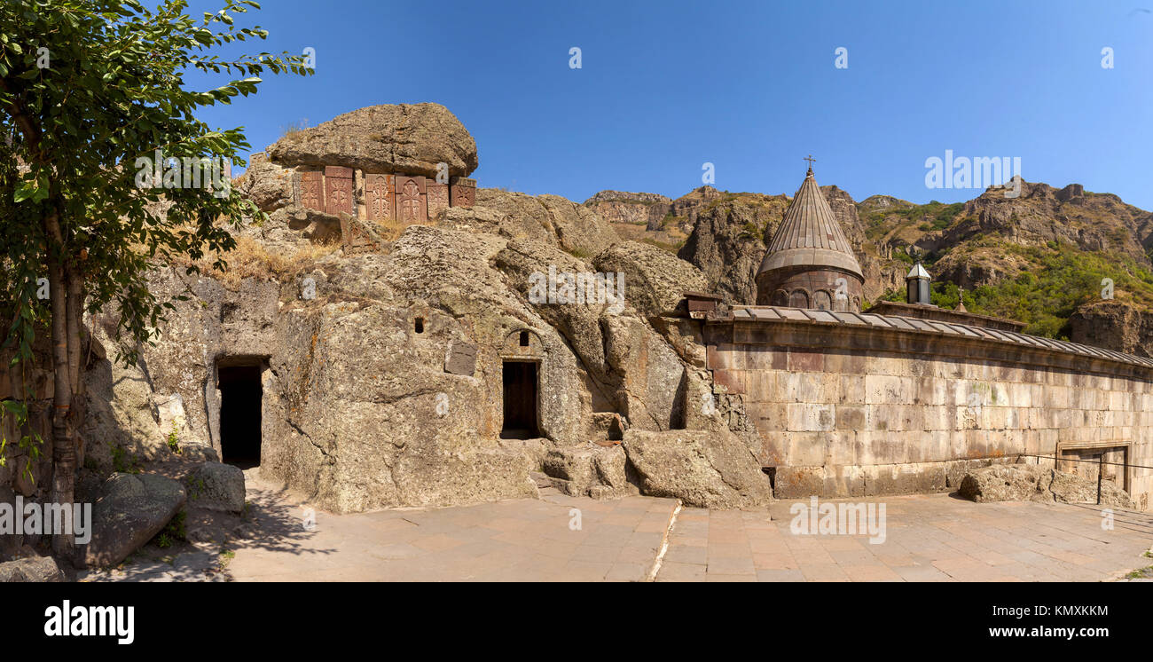 In the yard of the ancient Armenian temple complex Geghard Stock Photo ...