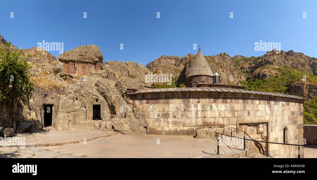 In the yard of the ancient Armenian temple complex Geghard Stock Photo ...