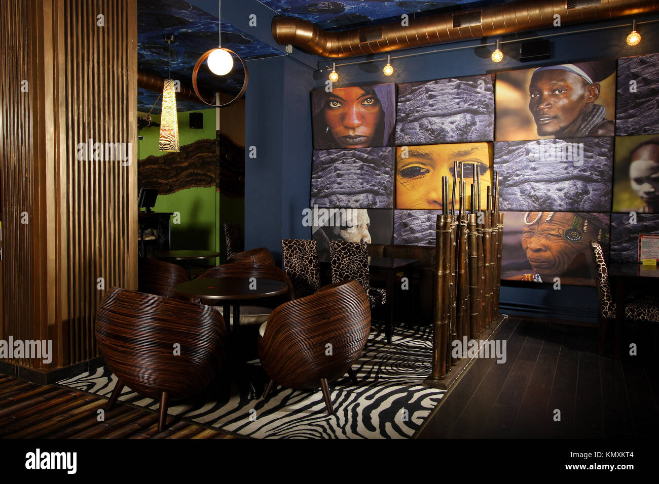 Interior of modern cafe in style of a safari Stock Photo - Alamy