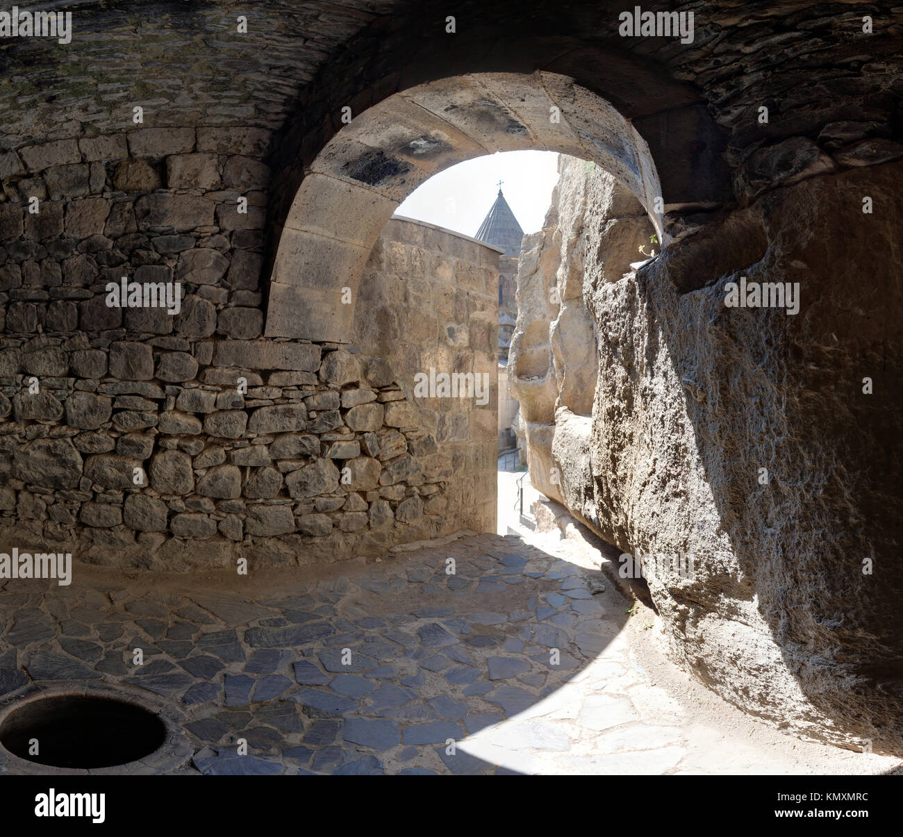 View from a grotto in the ancient Armenian temple complex Geghard Stock ...