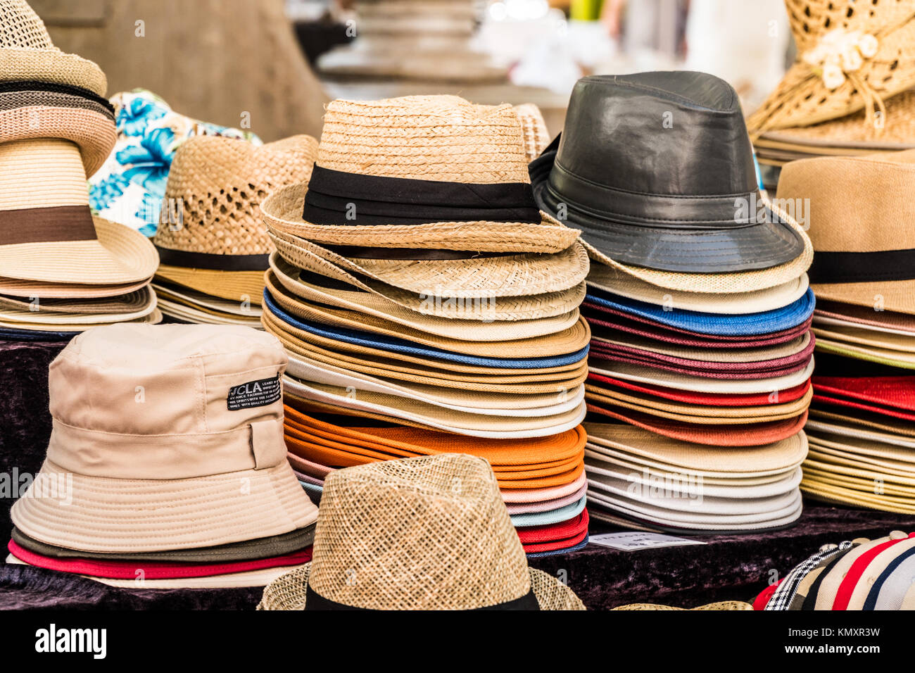 Collection of summer hats on the street market. Close-up Stock Photo ...