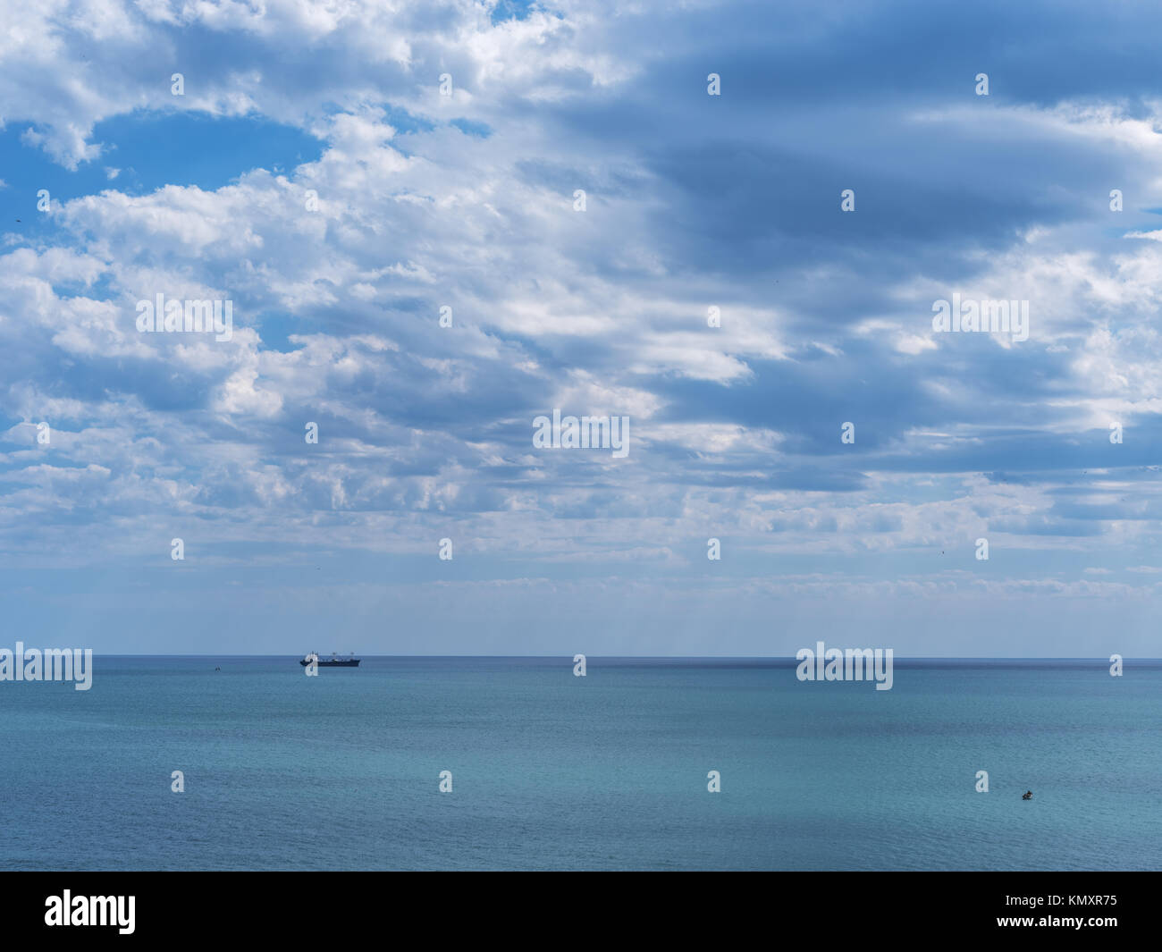 Calm sea and cloudy sky. Nature background Stock Photo - Alamy