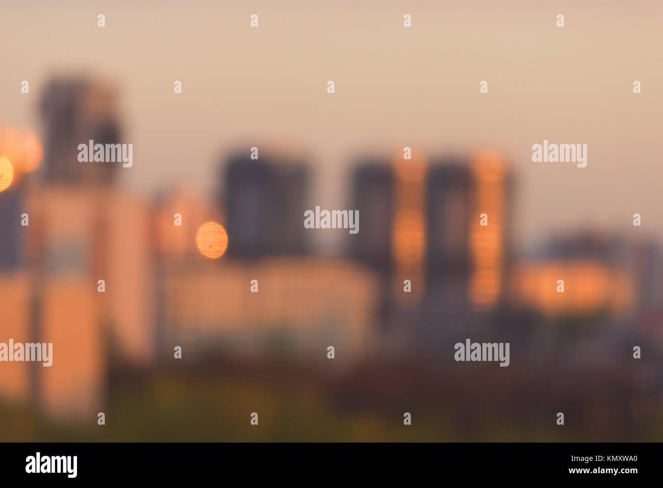blurred image of a city through window. sunrise Stock Photo - Alamy
