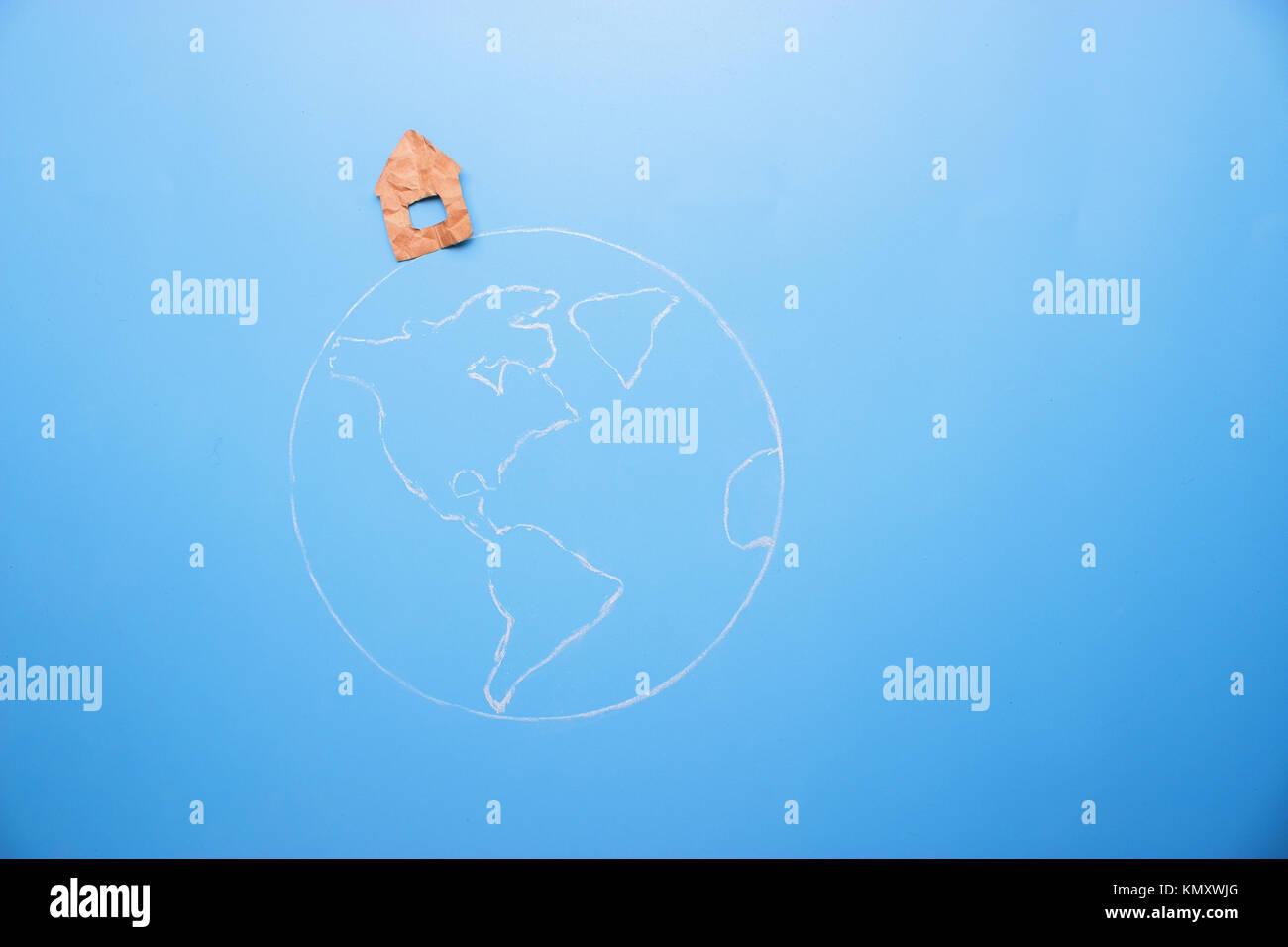 choose a place to live. paper house and a map Stock Photo - Alamy