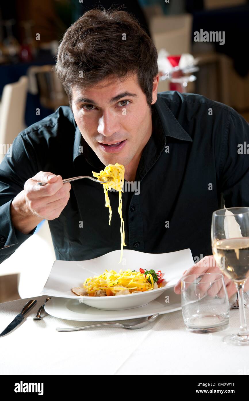 Man eating pasta vegetables not woman hi-res stock photography and ...