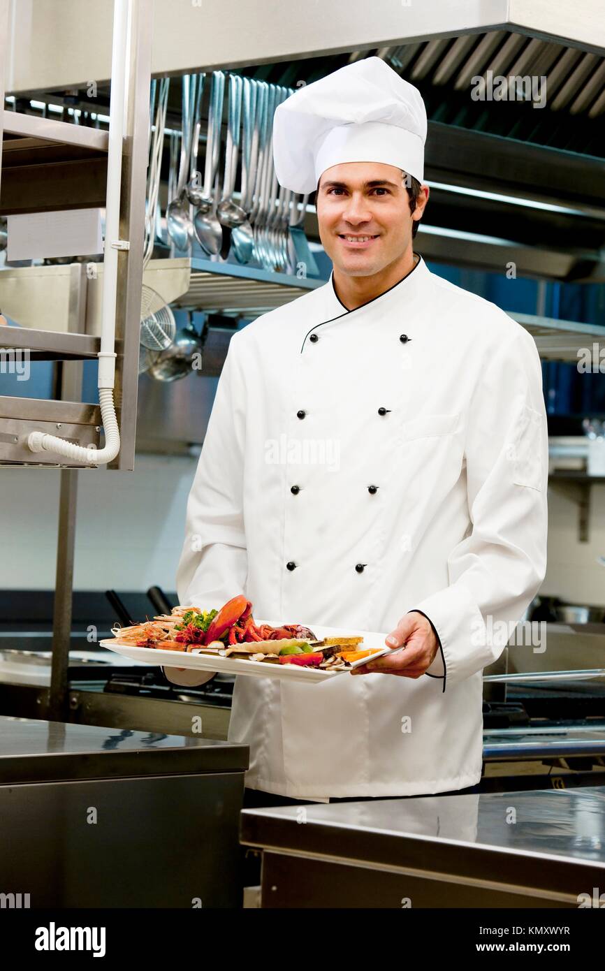Portrait of a male chef in the restaurant Stock Photo - Alamy