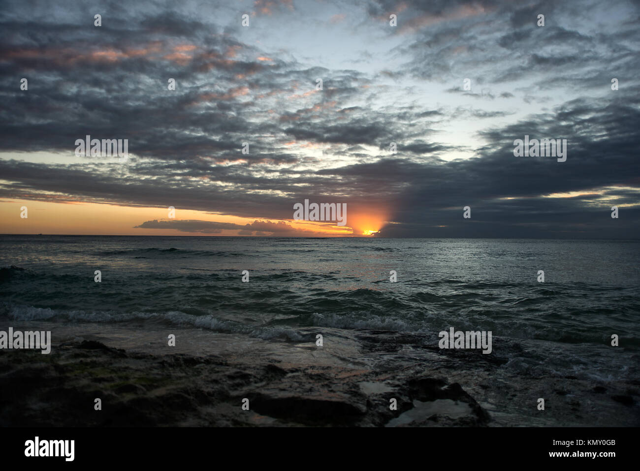 Wide angle sunset shot on a beach at Mauritius, dramatic clouds and ...
