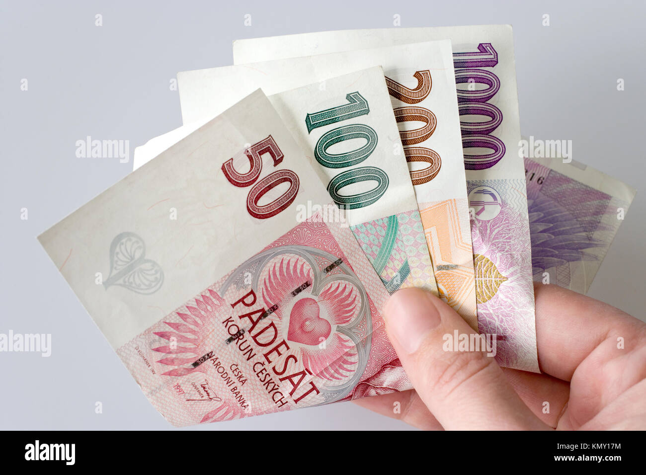 Czech crown CZK currency - banknotes in hand Stock Photo - Alamy