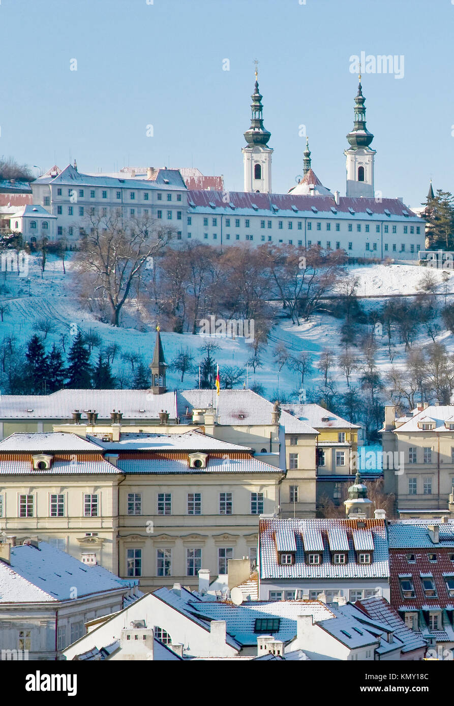 Strahov church and cloister, wintertime snowy day - snow covered towers ...