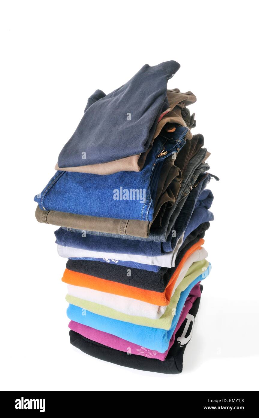 pile of folded clothes on white background Stock Photo - Alamy