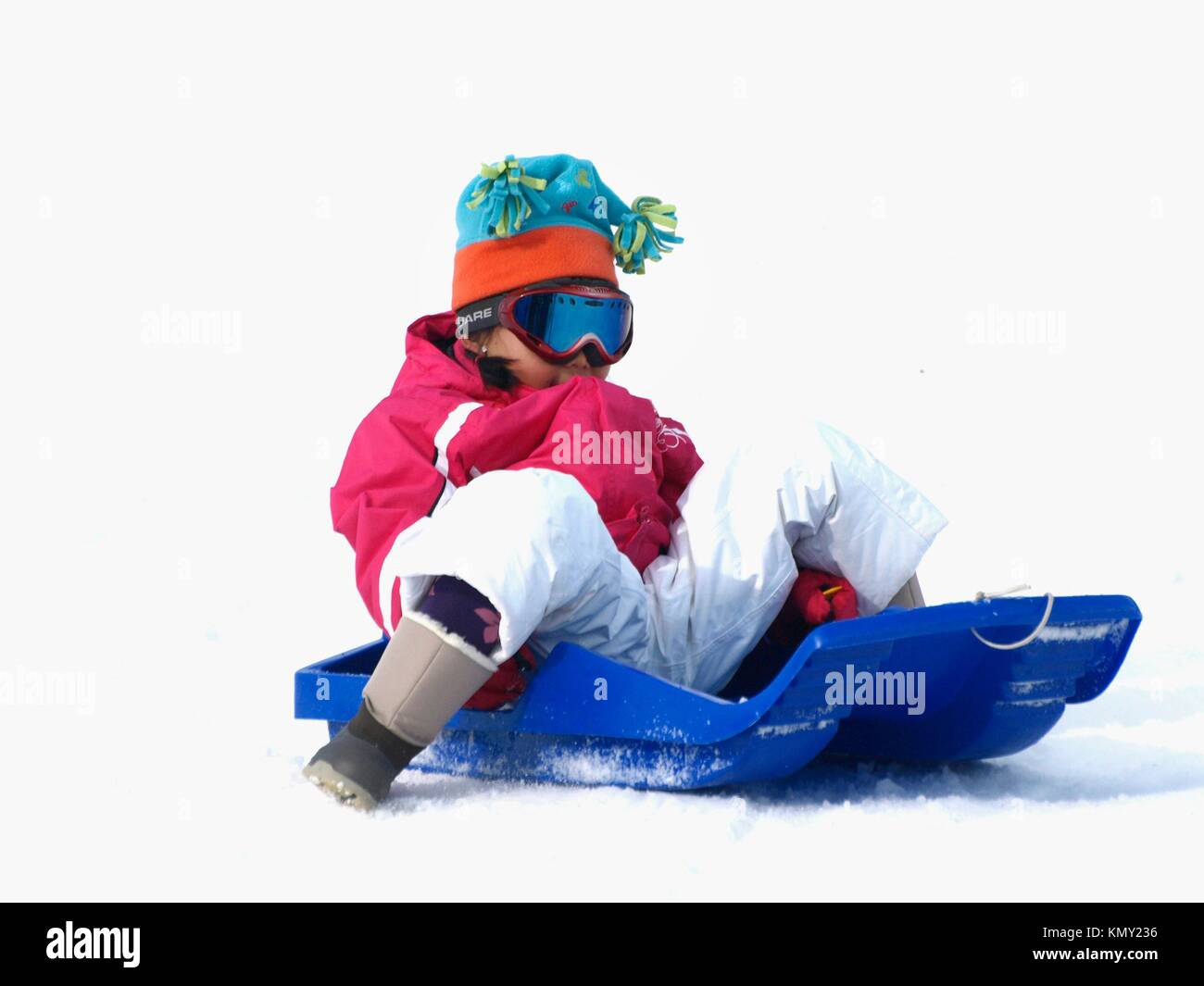 Girl on a sledge hi-res stock photography and images - Alamy