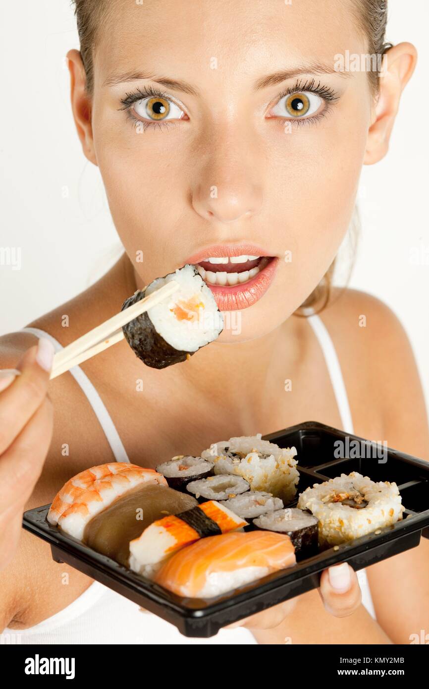 portrait of woman with sushi Stock Photo - Alamy