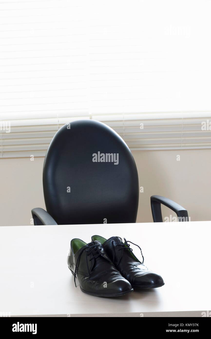 Business shoes on chair hi-res stock photography and images - Alamy