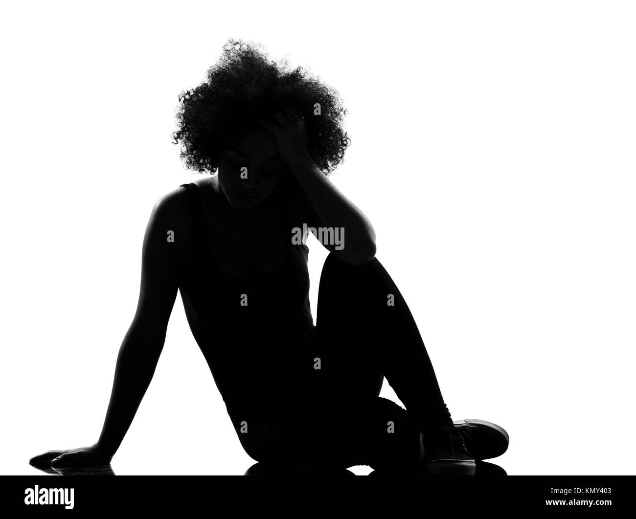 Girl sitting floor side view Black and White Stock Photos & Images - Alamy