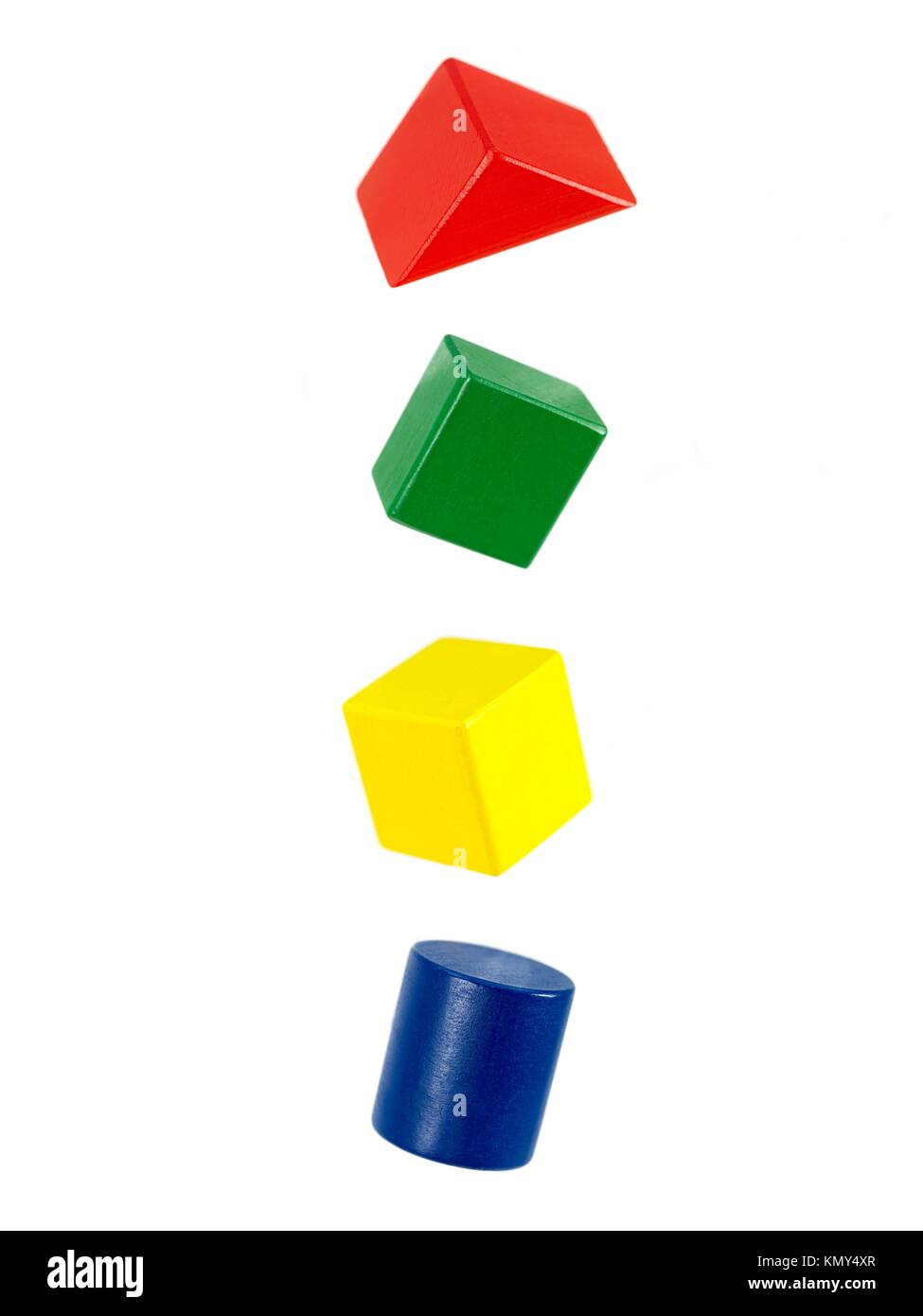 Wooden toy blocks isolated against a white background Stock Photo - Alamy